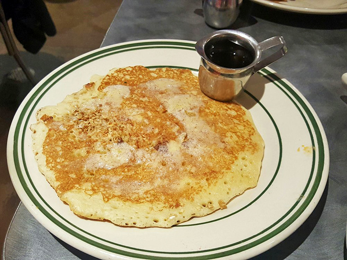 The humble pancake, elevated to art form. That perfect golden-brown exterior gives way to a fluffy interior that makes you forget all your troubles.