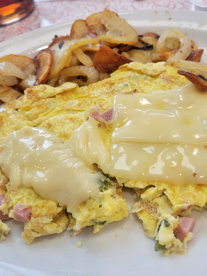 This cheese-blanketed omelet doesn't just whisper "good morning"&mdash;it belts it out like Sinatra in his prime.