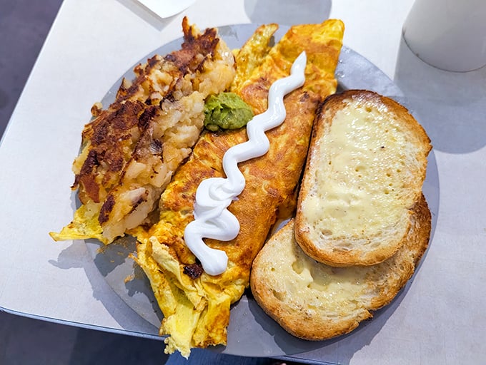 This omelet doesn't just sit on the plate&mdash;it commands it. Those lyonnaise potatoes aren't a side dish; they're co-stars in this breakfast drama.