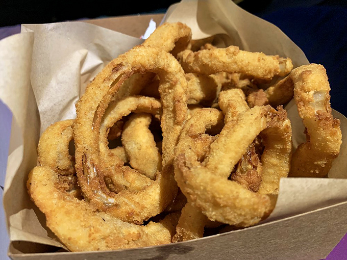 Golden halos of happiness! These onion rings achieve that mythical balance of crispy exterior and sweet, tender onion inside&mdash;worth every napkin you'll need.
