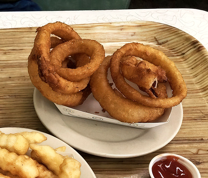 These onion rings deserve their own zip code&mdash;golden-brown circles of happiness that shatter with a satisfying crunch before melting into sweet onion bliss.