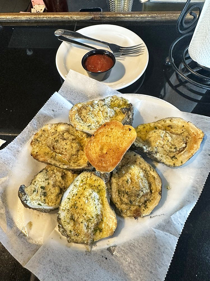 These aren't just oysters; they're buttery little time machines transporting you straight to coastal bliss.