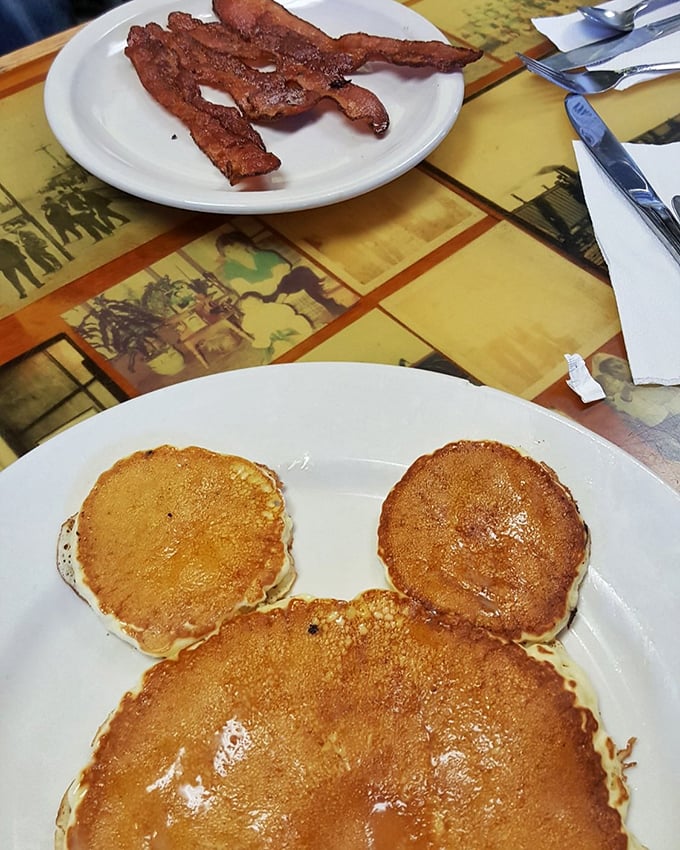 Mickey Mouse would approve of these golden pancakes. The bacon stands at attention, as if saluting your excellent food choices.