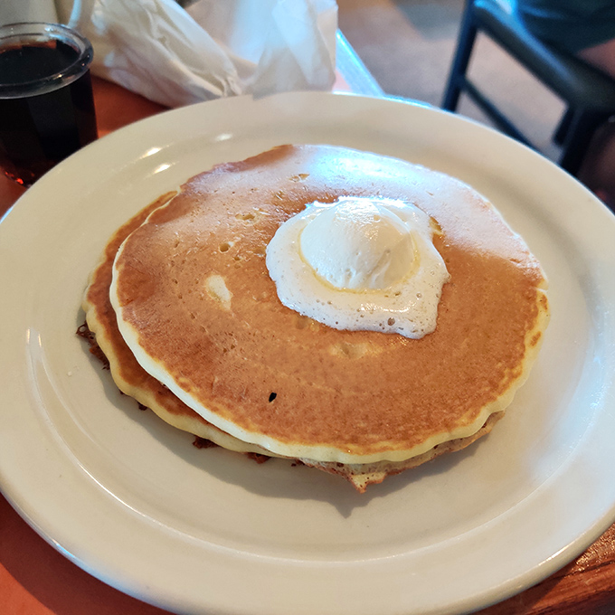This isn't just a pancake&mdash;it's a fluffy throne for that perfectly cooked egg, waiting to release its golden treasure.