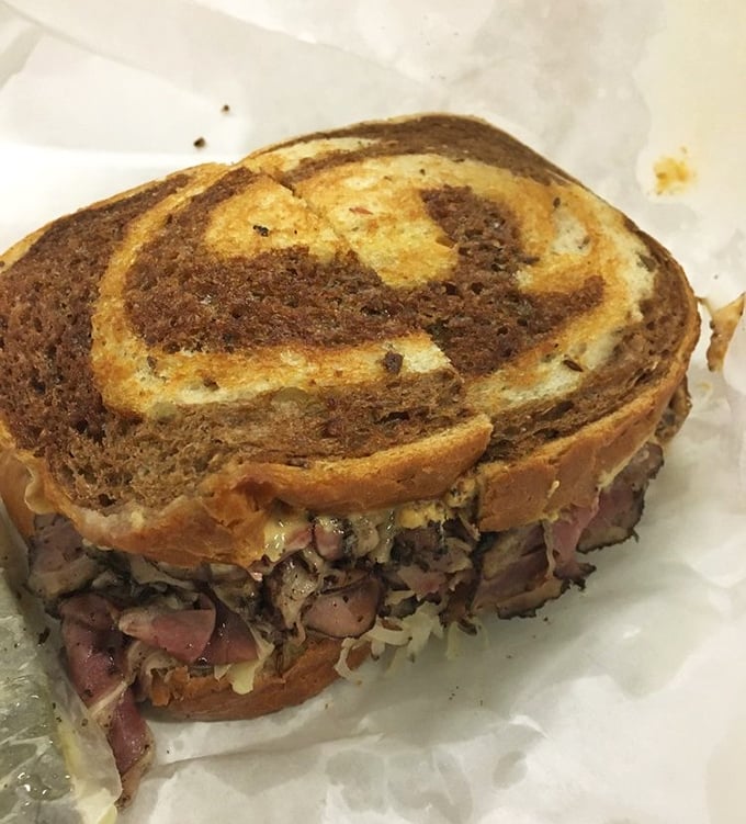 The marbled rye creates the perfect canvas for this work of art&mdash;a sandwich that demands both hands and your complete attention.