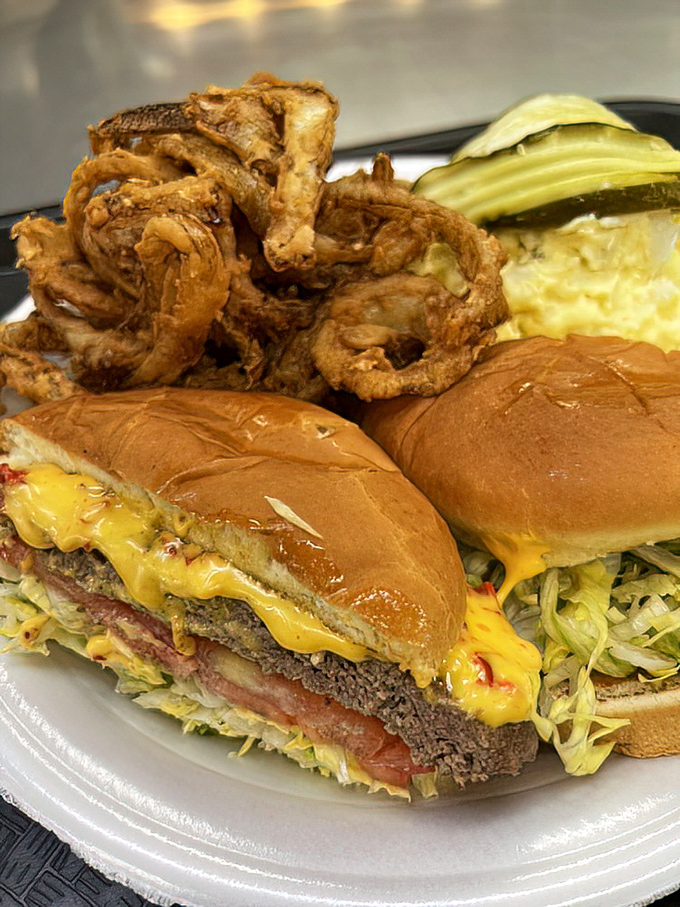 The pimento cheeseburger with crispy onion rings&mdash;where Southern tradition meets cardiac adventure. Worth every extra minute on the treadmill tomorrow.