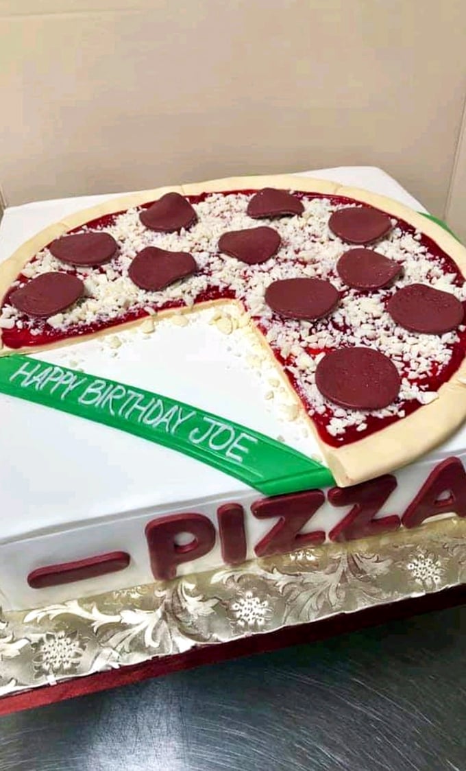 When someone loves pizza enough to want it as their birthday cake, you know you're among people who understand joy.