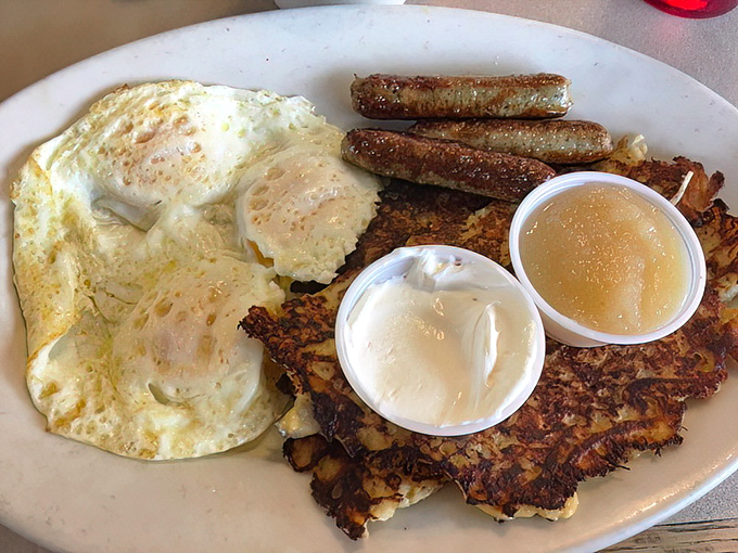 The Potato Pancake Breakfast brings together crispy potato pancakes, eggs, and sausage links&mdash;a trio more harmonious than The Supremes in their prime.