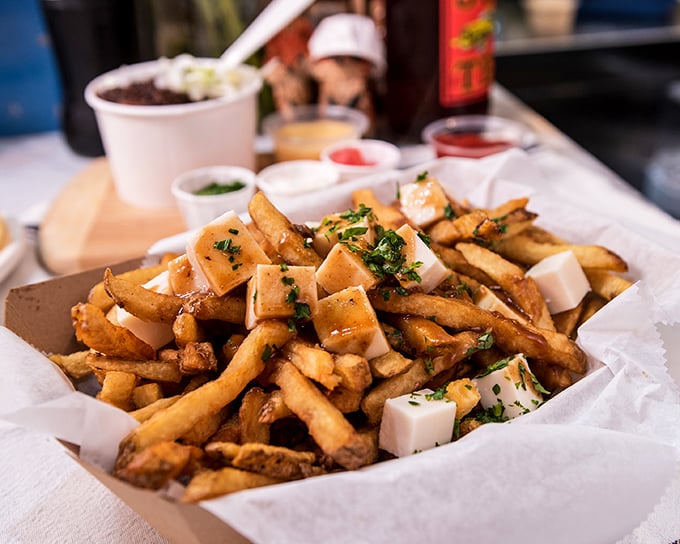 These aren't your average fries—they're potato diplomats, building international relations with cheese curds and savory toppings.