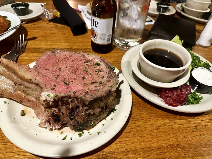 Prime rib so perfectly pink it could make a vegetarian question their life choices. The bone is just showing off.