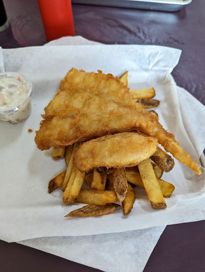 The Queen portion proves size isn't everything. This perfectly proportioned fish delivers the same crispy-outside, flaky-inside magic without requiring a royal appetite.