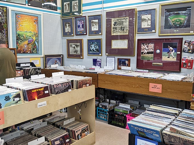 Vinyl enthusiasts can spend hours flipping through musical history while sports memorabilia watches from above.