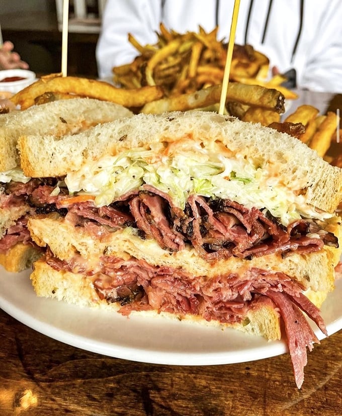 This Reuben isn't just a sandwich; it's a masterclass in texture and flavor that makes you want to stand up and slow clap.