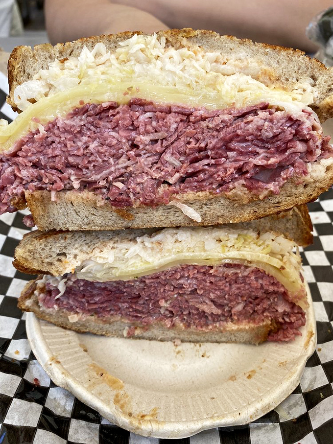 Behold the Reuben in cross-section&mdash;a geological wonder of meat strata that would make both geologists and gastronomes weep with joy.