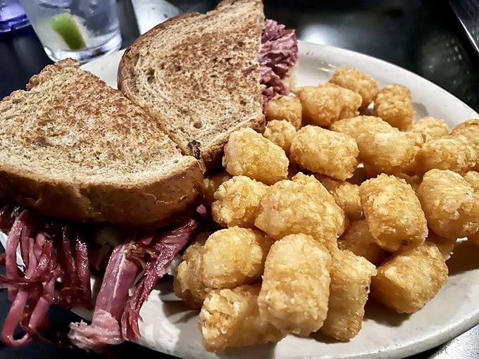 Tater tots: the unsung heroes of any proper diner meal. Here they're crispy little nuggets of potato perfection alongside a sandwich that means business.