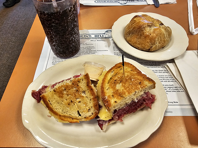 A properly constructed Reuben demands your full attention, while that knish on the side patiently waits its turn. This is sandwich architecture at its finest.