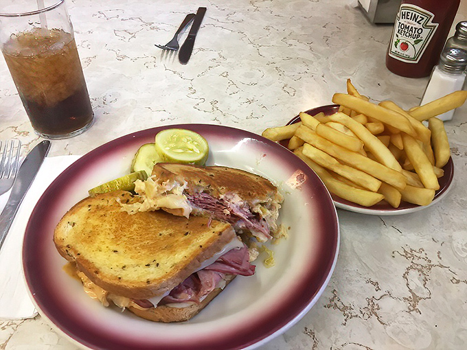 The classic diner equation: one perfect sandwich + crispy fries = happiness on a plate. No advanced degree in culinary arts required.