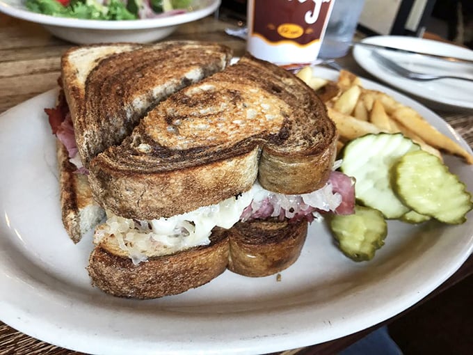 Behold the architectural marvel that is Kuby's Reuben &ndash; layers of meat and sauerkraut creating the sandwich equivalent of Beethoven's Fifth Symphony.