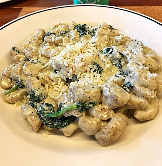 Pillowy gnocchi swimming in a creamy spinach sauce that makes you want to cancel all other dinner plans for the foreseeable future.