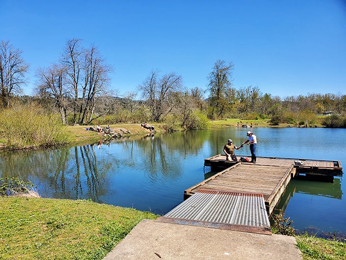 Fishing from the dock at Row River Nature Park&mdash;where catching nothing still feels like winning at life.