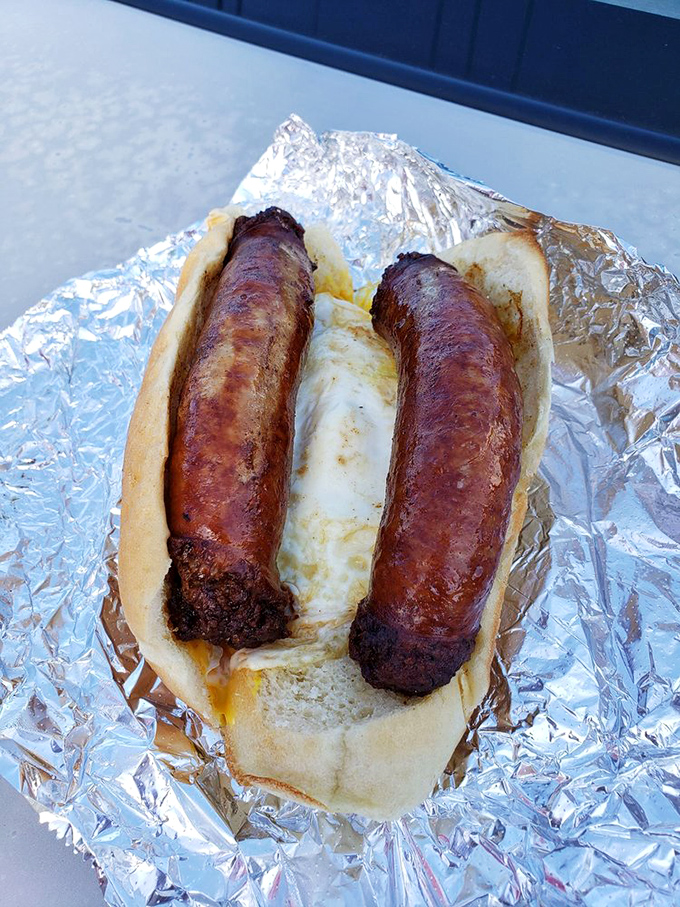 Two plump sausages nestled in a soft roll with an egg between them&mdash;a breakfast sandwich that makes hitting the snooze button a criminal offense.