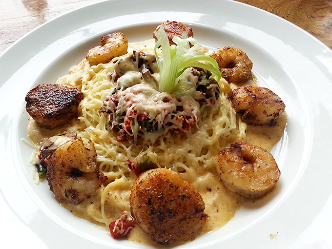 Cajun Fettuccine that would make New Orleans jealous. Those blackened scallops aren't just cooked—they're transformed into buttery little flavor bombs atop creamy pasta.