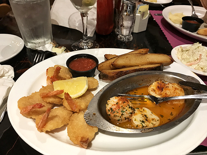 The seafood platter arrives like a maritime celebration—golden fried shrimp alongside buttery scallops that taste like they just said goodbye to the ocean.