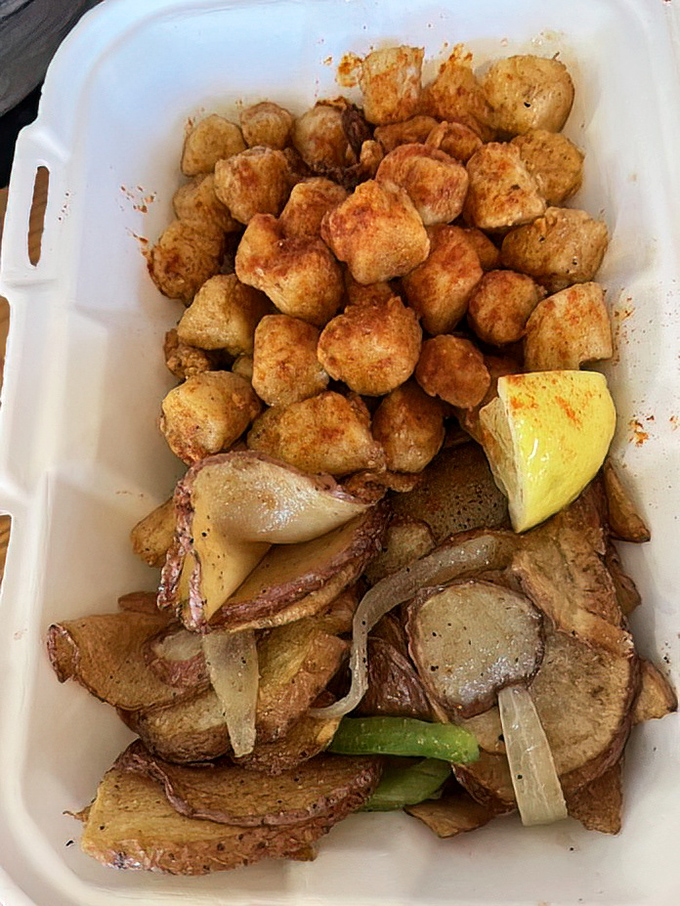 Golden nuggets of fried scallops nestled against crispy potatoes. The kind of meal that makes you question why you ever eat anything else.