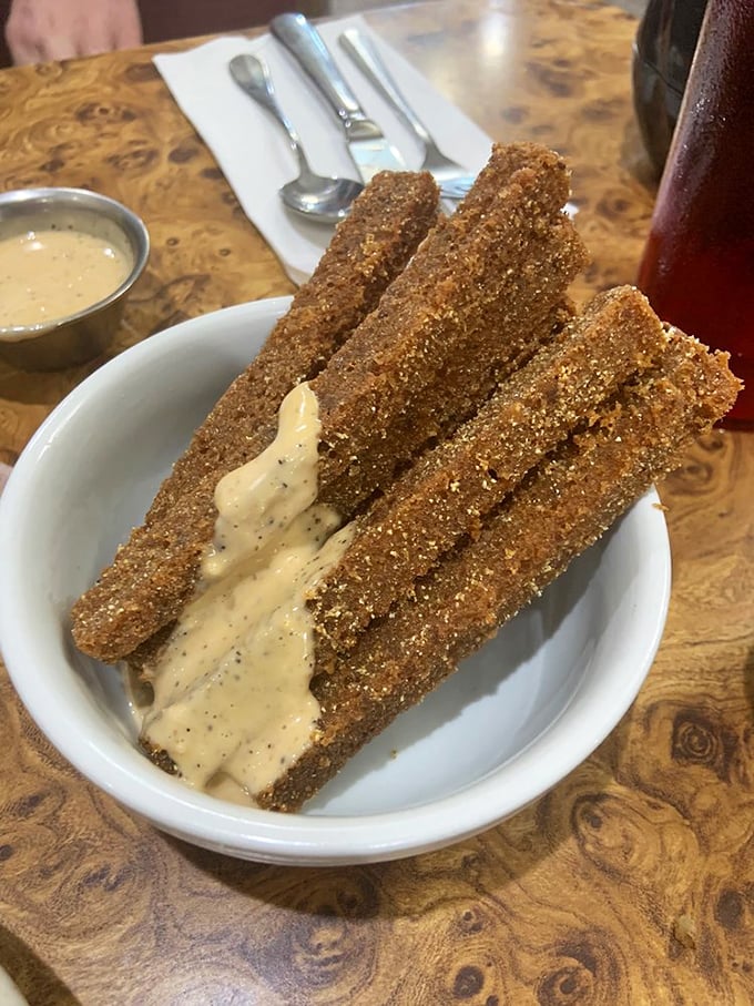 Scrapple fries: Philadelphia's answer to the question nobody asked but everyone needs. Crispy, savory, and utterly addictive with that creamy dipping sauce.