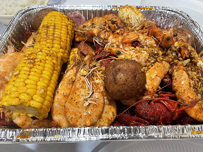 This seafood boil isn't just a meal; it's an event. Corn, potatoes, shrimp, and crawfish having the world's most delicious party.