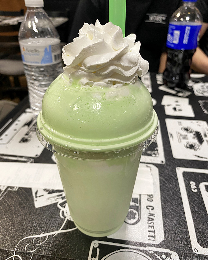 This mint-green masterpiece topped with whipped cream isn't just a shake&mdash;it's dessert with drinking privileges. Sip slowly to avoid brain freeze regret.