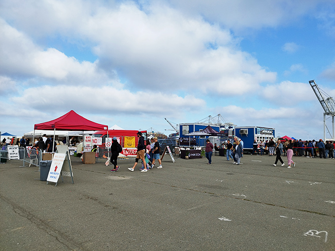 The faire's entrance area buzzes with anticipation as shoppers strategize their attack plan for the miles of merchandise ahead.