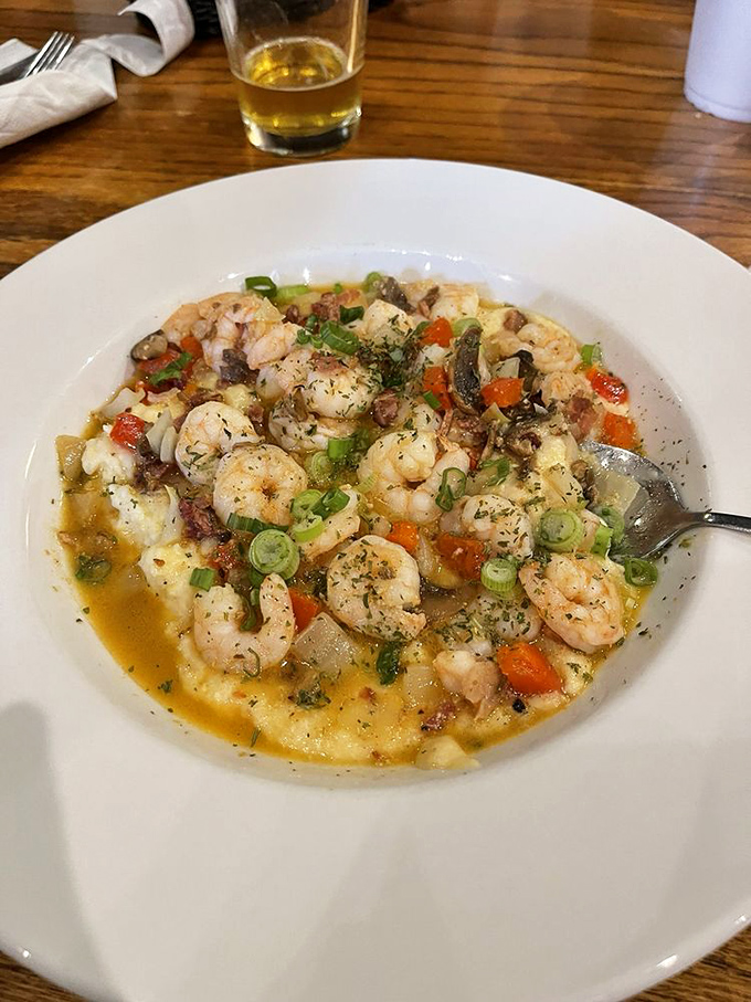 Shrimp and grits elevated to an art form &ndash; plump local shrimp nestled atop creamy stone-ground grits that would make any grandmother proud.