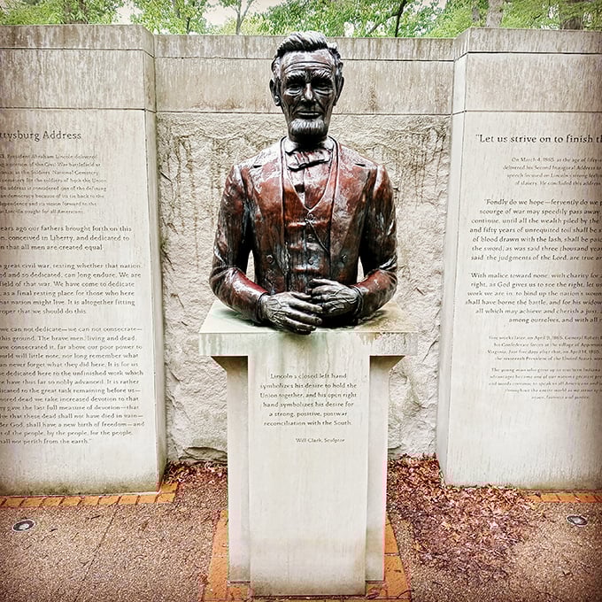 Honest Abe stands tall in bronze, his gaze fixed on the horizon, perhaps contemplating his journey from these humble woods to the White House.