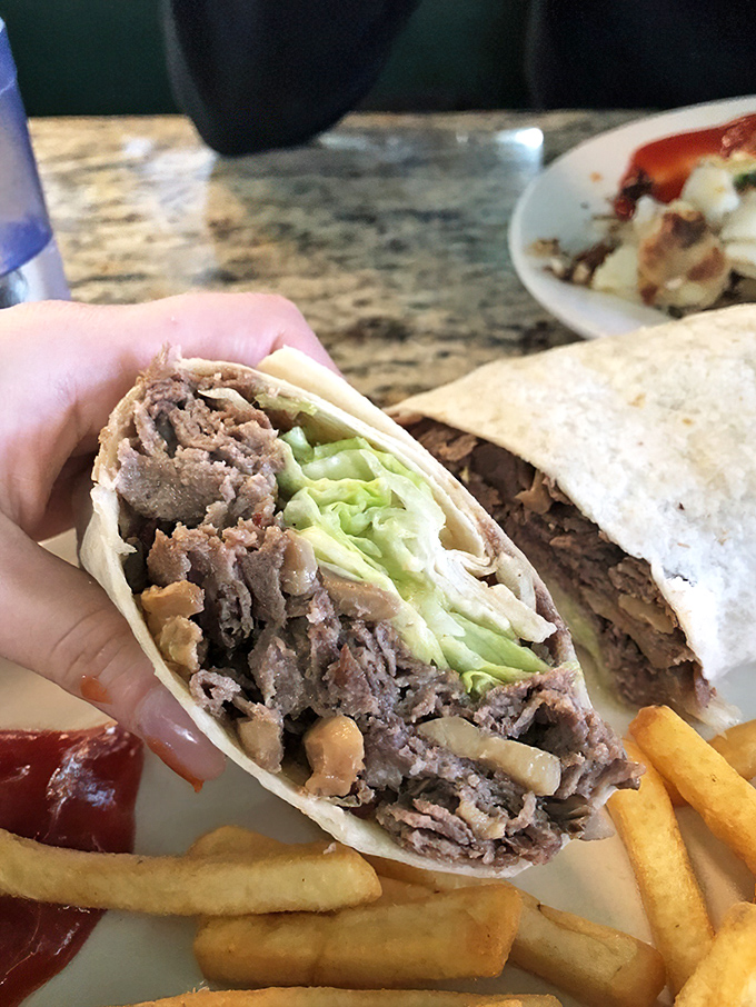 Peek inside this steak wrap and you'll understand why some people cross county lines just for lunch. Simple ingredients, executed perfectly.