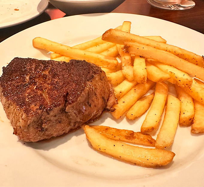 Sometimes simplicity speaks volumes. This perfectly seared steak alongside golden fries is the culinary equivalent of a greatest hits album&mdash;no filler, all killer.