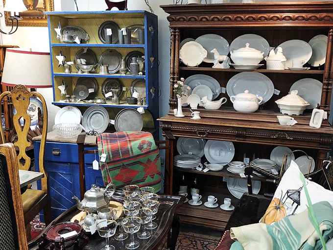 White china displayed on dark wood hutches&mdash;the antique equivalent of dressing formal for dinner every single night.
