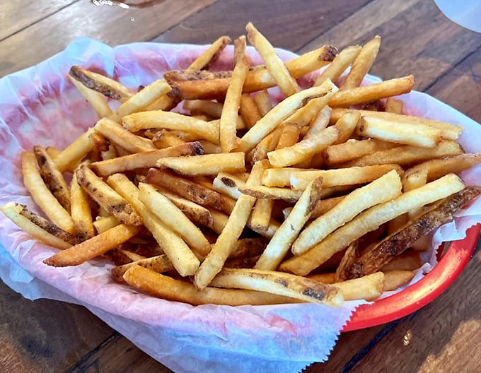 French fries so perfectly golden they deserve their own trophy case. The kind that make you reluctantly share, then immediately regret your generosity.