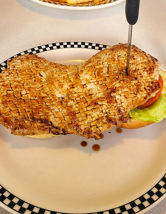 The breaded tenderloin &ndash; Indiana's unofficial state sandwich &ndash; extends well beyond its bun boundaries in a delicious act of culinary rebellion.