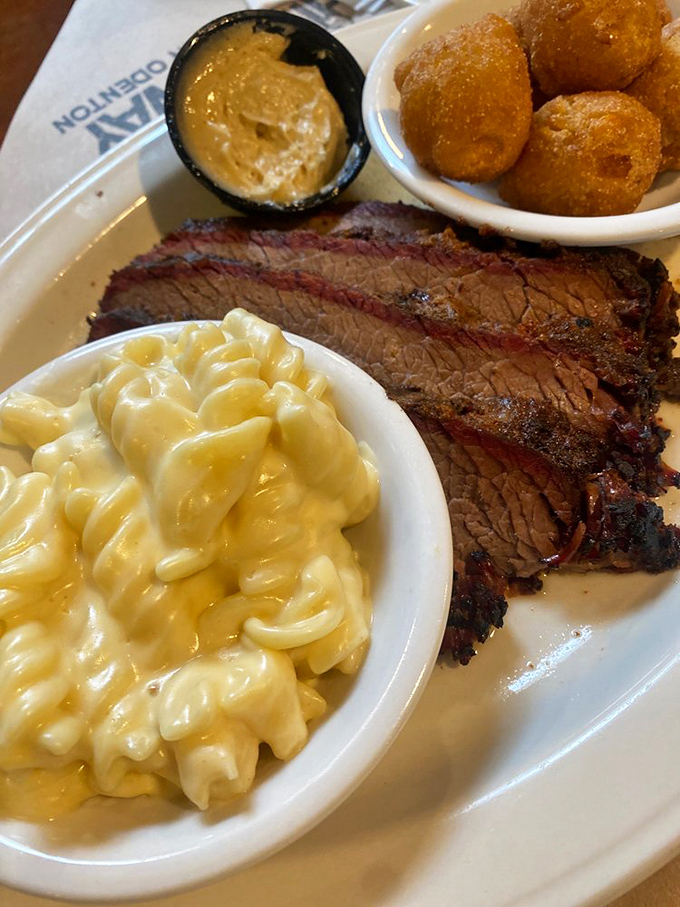 Smoke ring perfection meets cheesy indulgence. This brisket and mac combo is what would happen if Texas and Maryland signed a delicious peace treaty.
