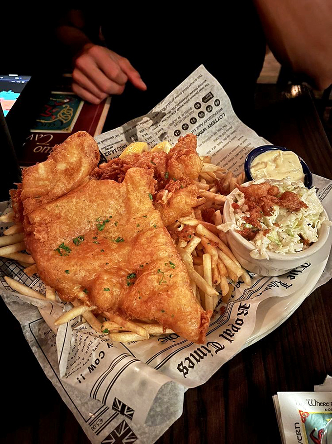 Crispy on the outside, flaky on the inside&mdash;this fish and chips plate isn't just food, it's edible architecture with a side of comfort.