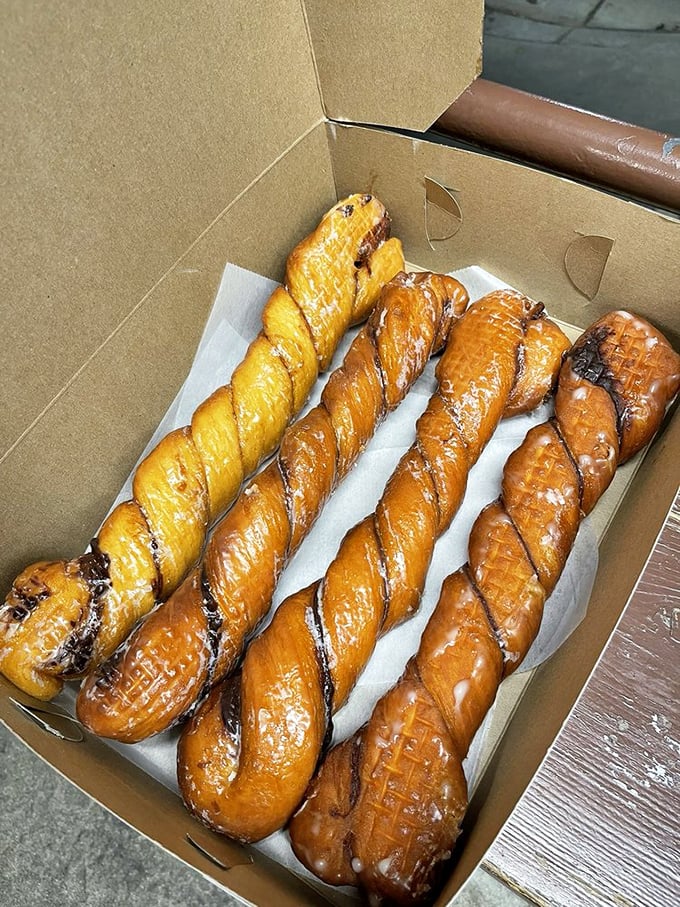 Tiger Tails: where vanilla and chocolate doughs intertwine in a spiral of harmony that would make even sworn enemies call a truce.