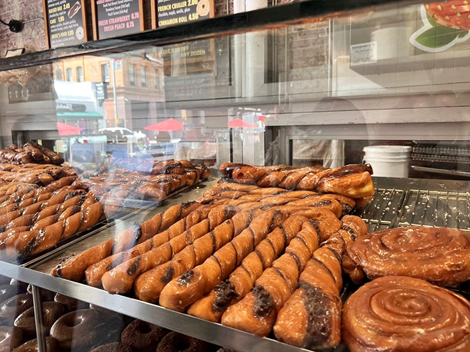 The tiger tail donuts coil seductively in their display case, promising the perfect chocolate-vanilla twist that keeps regulars coming back.