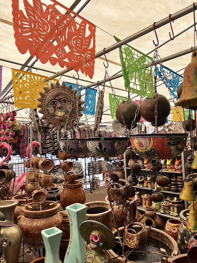 Hanging sun faces and colorful papel picado create a fiesta atmosphere while handcrafted bowls wait to become conversation pieces in your home.