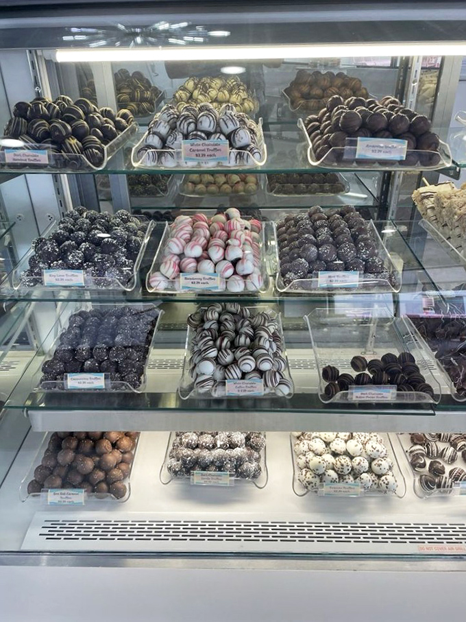 Chocolate truffles arranged with military precision, each one a tiny edible work of art waiting to ambush your diet plans.