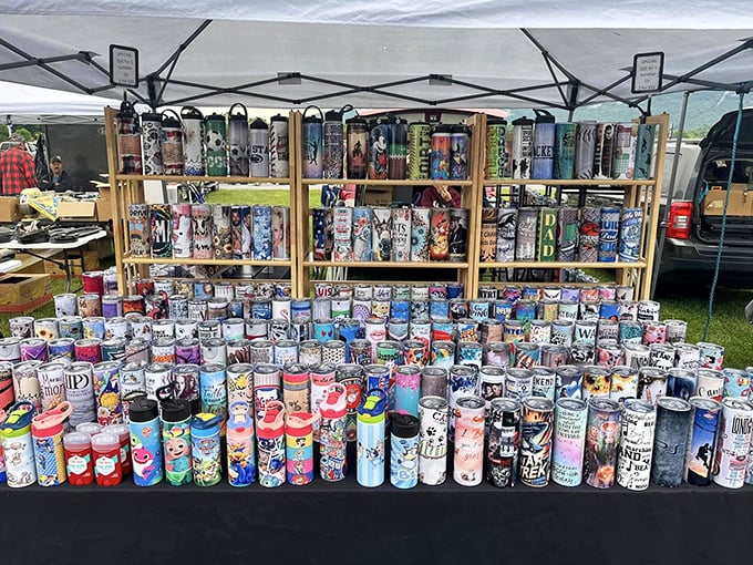 A tumbler collector's dream come true! These colorful drink vessels stand at attention like soldiers ready to march into someone's kitchen cabinet.