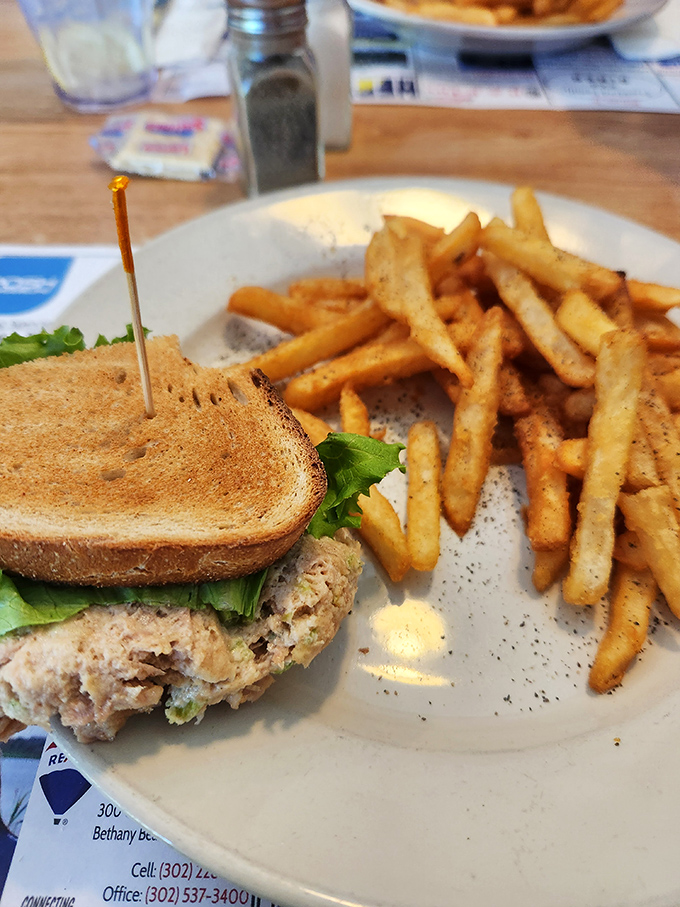 A tuna melt that would make your grandmother proud, paired with fries that achieve that perfect crisp-to-fluffy ratio. Simple pleasures executed with surprising precision.