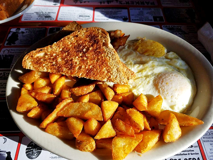 Breakfast architecture at its finest&mdash;golden home fries, perfectly cooked eggs, and toast that's achieved that mythical balance between crisp and tender.