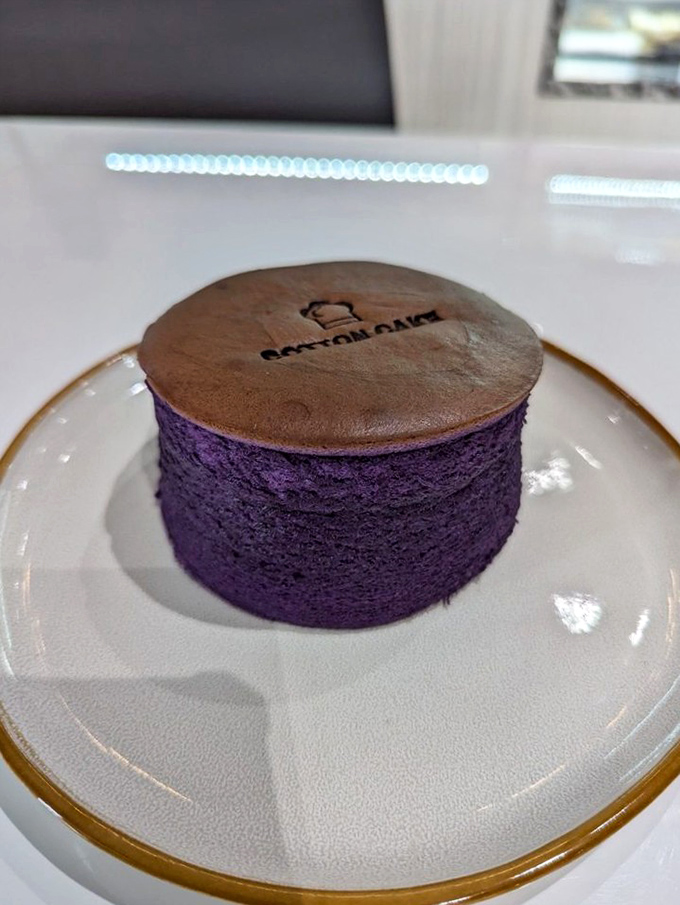 This purple masterpiece isn't having an identity crisis&mdash;it's ube cheesecake, wearing its vibrant color like a royal robe and daring you not to be impressed.