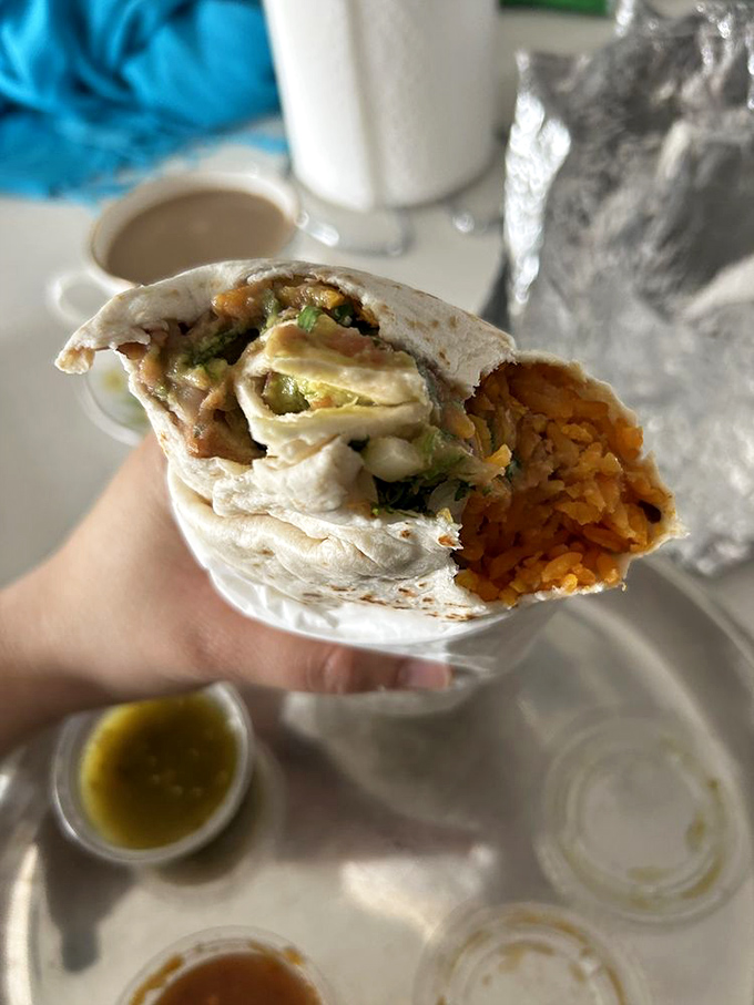 A cross-section that reveals the architectural marvel within&mdash;layers of flavor carefully constructed like the world's most delicious Jenga tower.